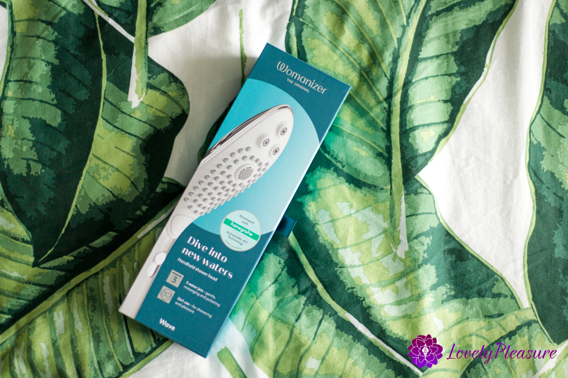 Test de la douchette Womanizer Wave - Le pommeau de douche combiné avec ...